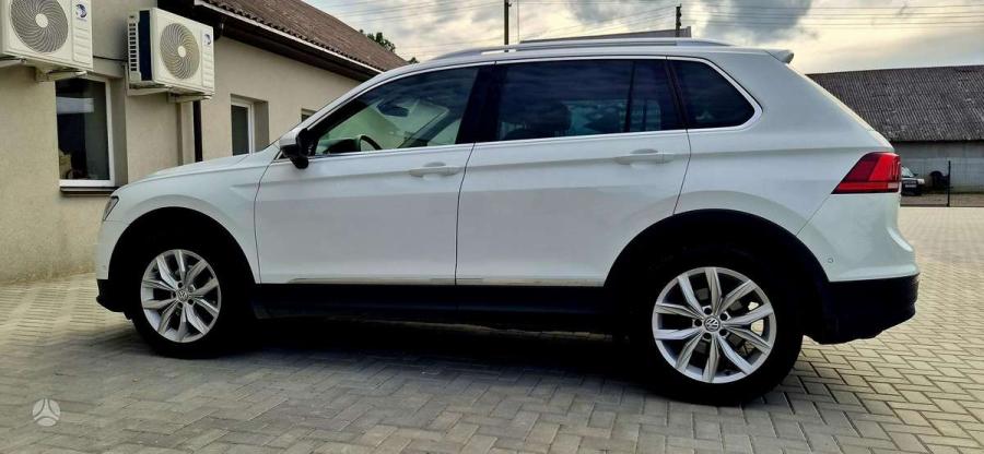 White Volkswagen Tiguan 2016 in Taurage, with an engine capacity of 1.97 L and mileage of 257 thousand km for 11100 €, photo 14 on AUTOMOTO.COM.LV