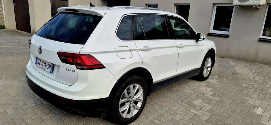 White Volkswagen Tiguan 2016 in Taurage, with an engine capacity of 1.97 L and mileage of 257 thousand km for 11100 €, photo 15 on AUTOMOTO.COM.LV