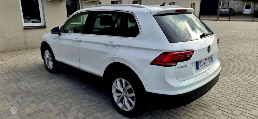 White Volkswagen Tiguan 2016 in Taurage, with an engine capacity of 1.97 L and mileage of 257 thousand km for 11100 €, photo 23 on AUTOMOTO.COM.LV
