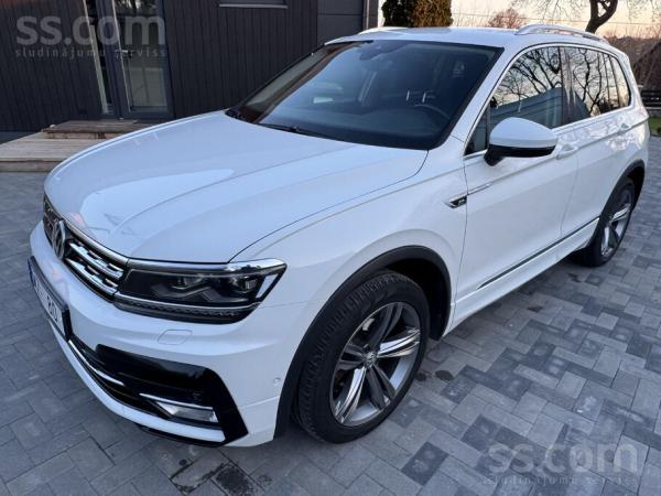 White Volkswagen Tiguan 2016 in Riga, with an engine capacity of 2.00 L and mileage of 294 thousand km for 15200 €, photo 1 on AUTOMOTO.COM.LV