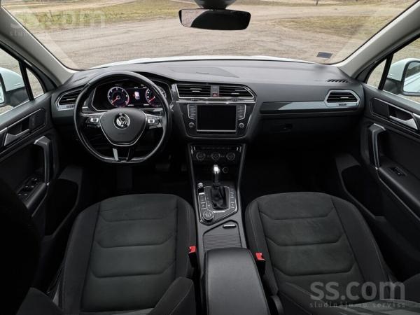 White Volkswagen Tiguan 2016 in Riga, with an engine capacity of 2.00 L and mileage of 294 thousand km for 15200 €, photo 9 on AUTOMOTO.COM.LV