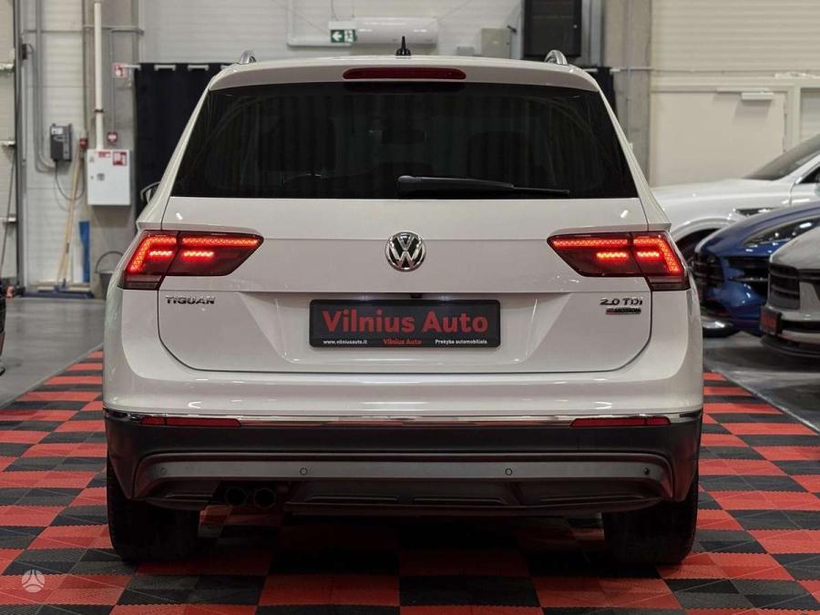 White Volkswagen Tiguan 2016 in Vilnius, with an engine capacity of 1.97 L and mileage of 290 thousand km for 17490 €, photo 6 on AUTOMOTO.COM.LV