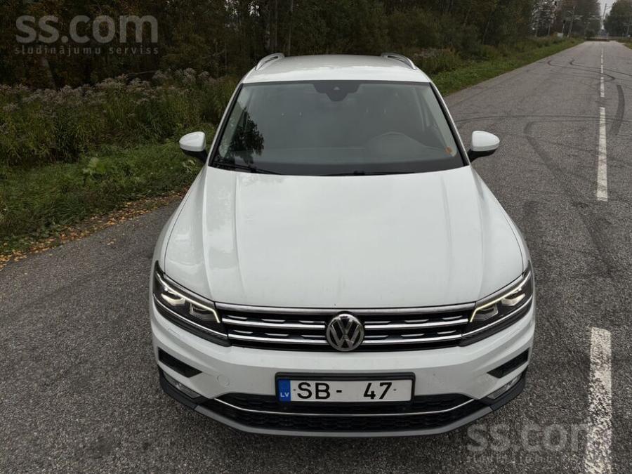 White Volkswagen Tiguan 2016 in Riga, with an engine capacity of 2.00 L and mileage of 190 thousand km for 14500 €, photo 1 on AUTOMOTO.COM.LV
