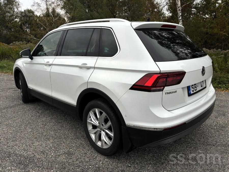 White Volkswagen Tiguan 2016 in Riga, with an engine capacity of 2.00 L and mileage of 190 thousand km for 14500 €, photo 5 on AUTOMOTO.COM.LV