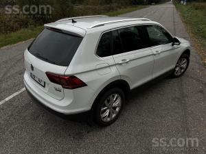 White Volkswagen Tiguan 2016 in Riga, with an engine capacity of 2.00 L and mileage of 190 thousand km for 14500 €, photo 6 on AUTOMOTO.COM.LV