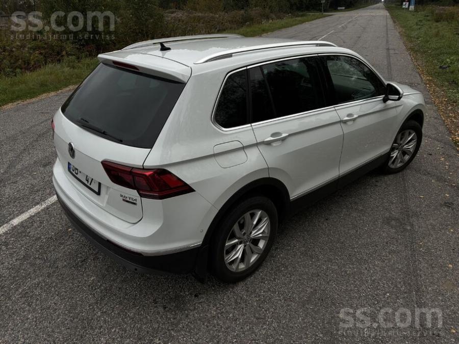 White Volkswagen Tiguan 2016 in Riga, with an engine capacity of 2.00 L and mileage of 190 thousand km for 14500 €, photo 6 on AUTOMOTO.COM.LV