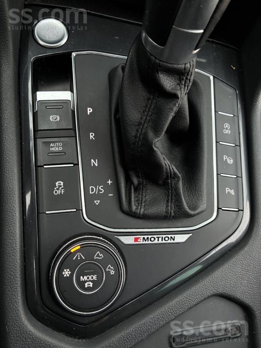 White Volkswagen Tiguan 2016 in Riga, with an engine capacity of 2.00 L and mileage of 190 thousand km for 14500 €, photo 9 on AUTOMOTO.COM.LV