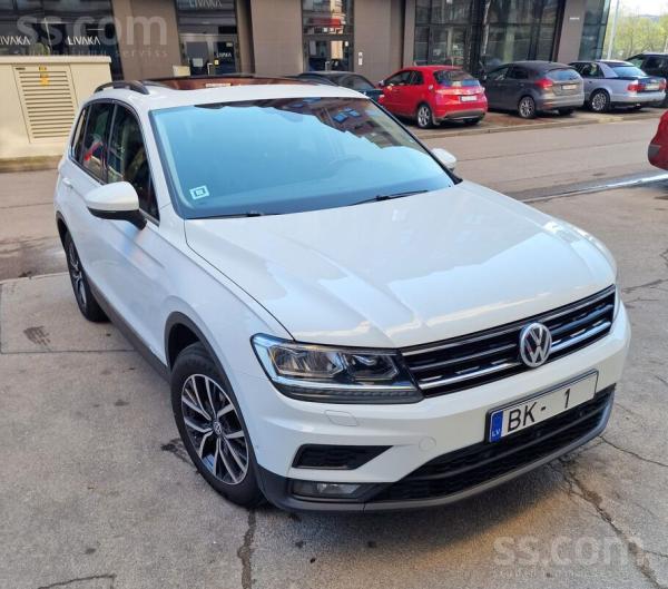 White Volkswagen Tiguan 2017 in Riga, with an engine capacity of 2.00 L and mileage of 263 thousand km for 13000 €, photo 1 on AUTOMOTO.COM.LV