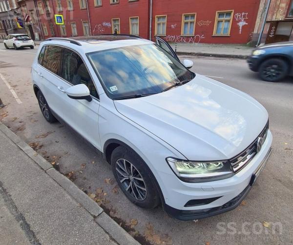 White Volkswagen Tiguan 2017 in Riga, with an engine capacity of 2.00 L and mileage of 263 thousand km for 13000 €, photo 2 on AUTOMOTO.COM.LV