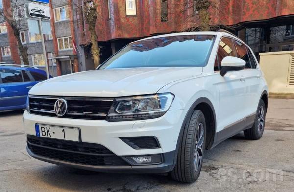 White Volkswagen Tiguan 2017 in Riga, with an engine capacity of 2.00 L and mileage of 263 thousand km for 13000 €, photo 4 on AUTOMOTO.COM.LV