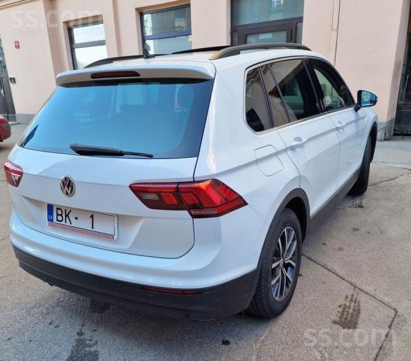 White Volkswagen Tiguan 2017 in Riga, with an engine capacity of 2.00 L and mileage of 263 thousand km for 13000 €, photo 5 on AUTOMOTO.COM.LV