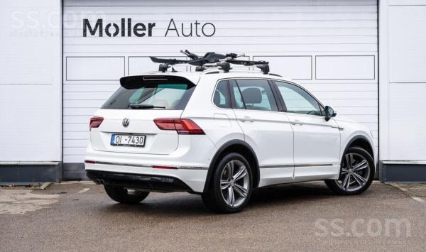 White Volkswagen Tiguan 2017 in Riga, with an engine capacity of 2.00 L and mileage of 150 thousand km for 19300 €, photo 4 on AUTOMOTO.COM.LV