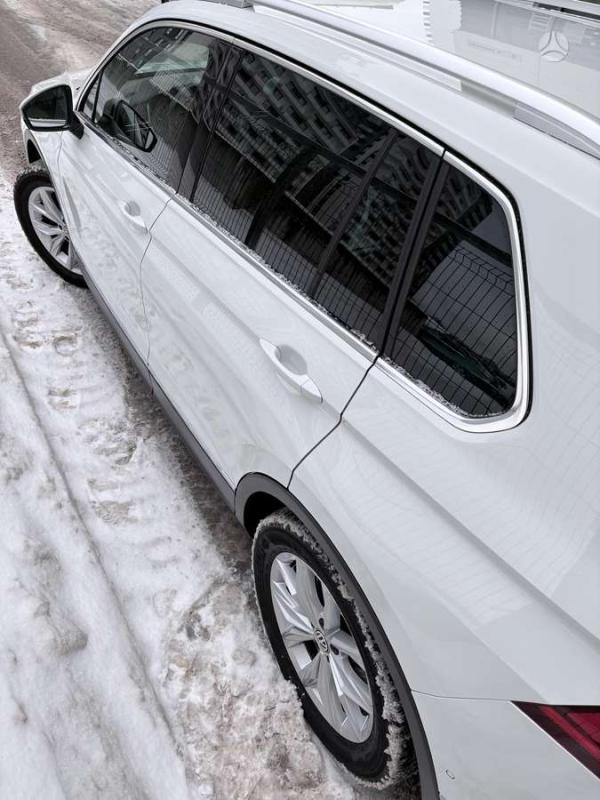 White Volkswagen Tiguan 2017 in Vilnius, with an engine capacity of 1.40 L and mileage of 147 thousand km for 18300 €, photo 6 on AUTOMOTO.COM.LV