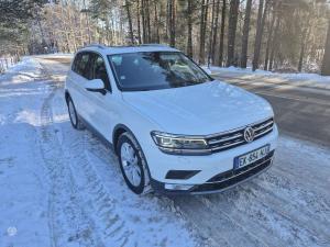 White Volkswagen Tiguan 2017 in Taurage, with an engine capacity of 1.97 L and mileage of 185 thousand km for 14700 €, photo 3 on AUTOMOTO.COM.LV