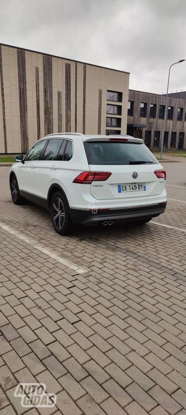 White Volkswagen Tiguan 2017 in Taurage, with an engine capacity of 20.00 L and mileage of 260 thousand km for 16000 €, photo 4 on AUTOMOTO.COM.LV