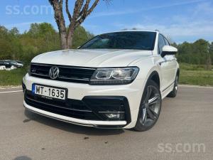 White Volkswagen Tiguan 2017 in Aluksne, with an engine capacity of 2.00 L and mileage of 353 thousand km for 15900 €, photo 4 on AUTOMOTO.COM.LV