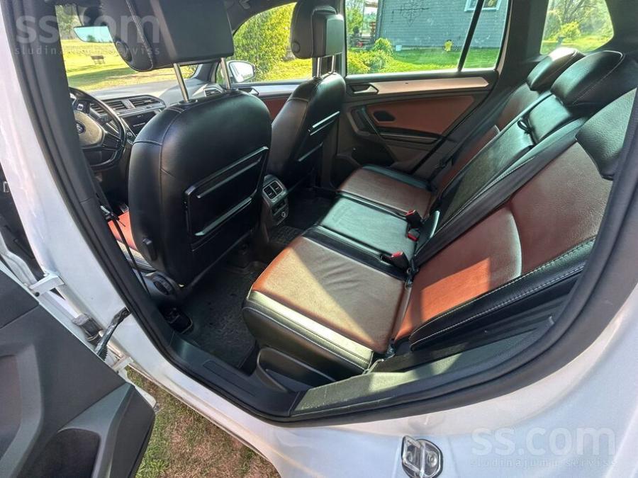 White Volkswagen Tiguan 2017 in Aluksne, with an engine capacity of 2.00 L and mileage of 353 thousand km for 15900 €, photo 5 on AUTOMOTO.COM.LV