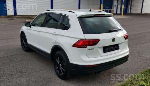 White Volkswagen Tiguan 2017 in Riga, with an engine capacity of 2.00 L and mileage of 256 thousand km for 13500 €, photo 7 on AUTOMOTO.COM.LV