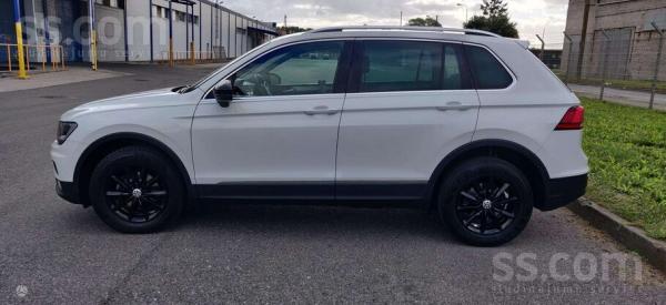 White Volkswagen Tiguan 2017 in Riga, with an engine capacity of 2.00 L and mileage of 256 thousand km for 13500 €, photo 7 on AUTOMOTO.COM.LV