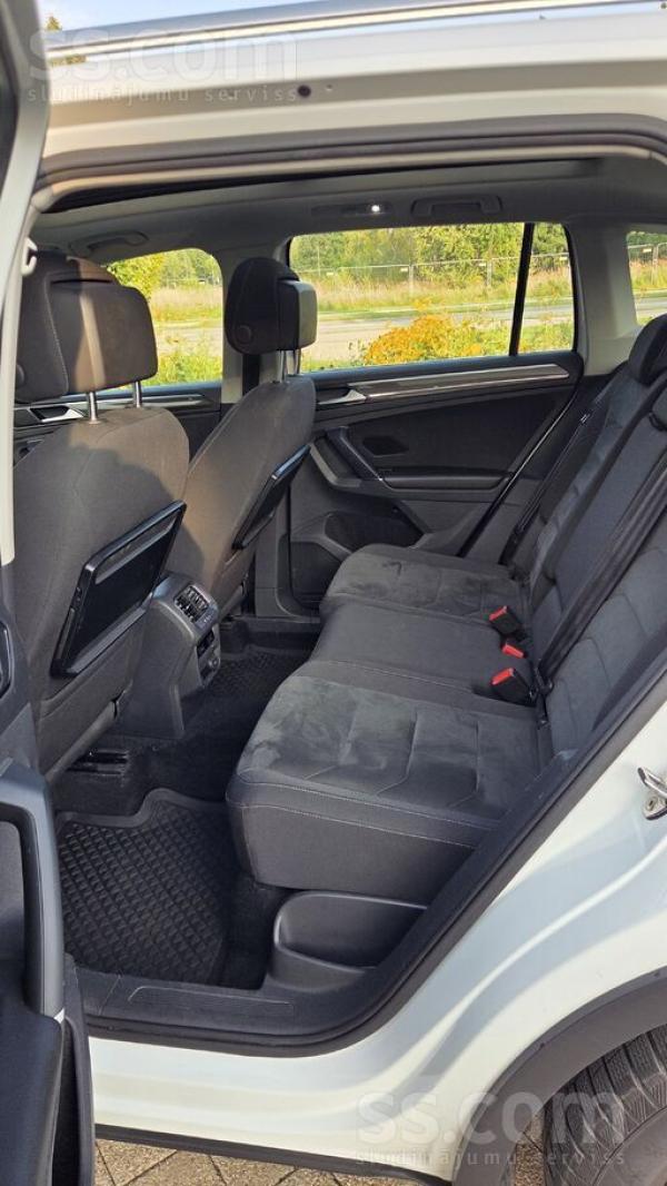 White Volkswagen Tiguan 2017 in Jurmala, with an engine capacity of 2.00 L and mileage of 205 thousand km for 15100 €, photo 9 on AUTOMOTO.COM.LV