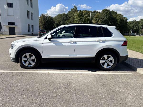 White Volkswagen Tiguan 2017 in Kaunas, with an engine capacity of 1.97 L and mileage of 242 thousand km for 13299 €, photo 6 on AUTOMOTO.COM.LV
