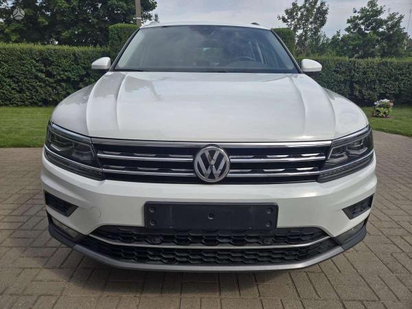 White Volkswagen Tiguan 2017 in Ukmerge, with an engine capacity of 1.97 L and mileage of 240 thousand km for 13950 €, photo 3 on AUTOMOTO.COM.LV