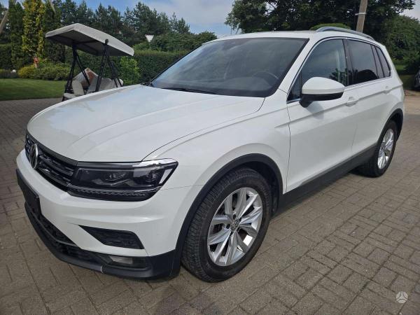 White Volkswagen Tiguan 2017 in Ukmerge, with an engine capacity of 1.97 L and mileage of 240 thousand km for 13950 €, photo 4 on AUTOMOTO.COM.LV