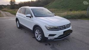 White Volkswagen Tiguan 2017 in Vilnius, with an engine capacity of 2.00 L and mileage of 500 thousand km for 8500 €, photo 4 on AUTOMOTO.COM.LV