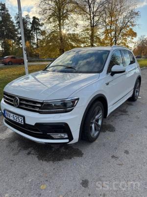 White Volkswagen Tiguan 2017 in Riga, with an engine capacity of 2.00 L and mileage of 264 thousand km for 16500 €, photo 1 on AUTOMOTO.COM.LV