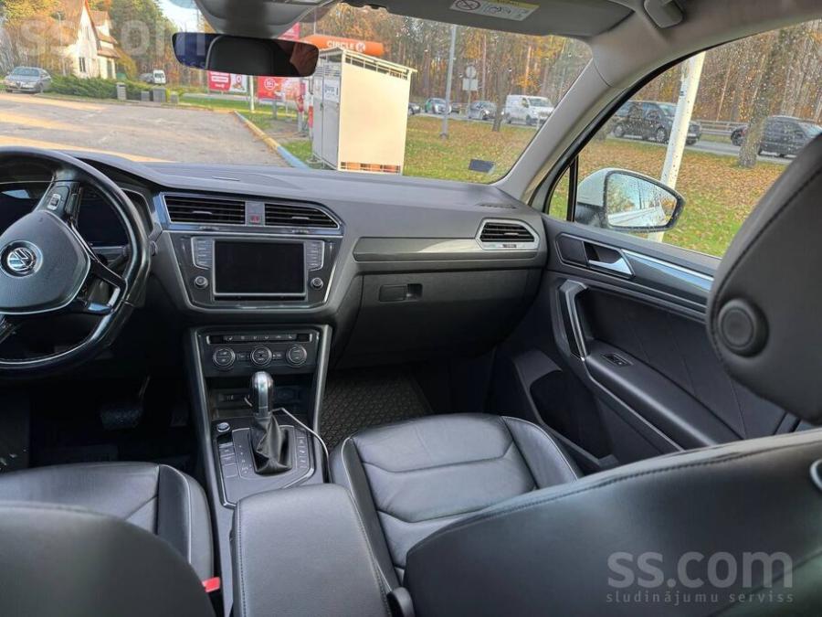 White Volkswagen Tiguan 2017 in Riga, with an engine capacity of 2.00 L and mileage of 264 thousand km for 16500 €, photo 7 on AUTOMOTO.COM.LV