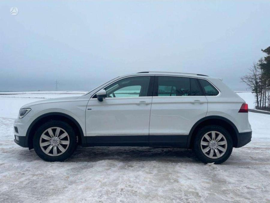 White Volkswagen Tiguan 2018 in Vilnius, with an engine capacity of 1.97 L and mileage of 201 thousand km for 18500 €, photo 1 on AUTOMOTO.COM.LV