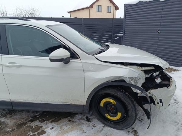White Volkswagen Tiguan 2018 in Klaipeda, with an engine capacity of 2.00 L and mileage of 250 thousand km for 7700 €, photo 2 on AUTOMOTO.COM.LV