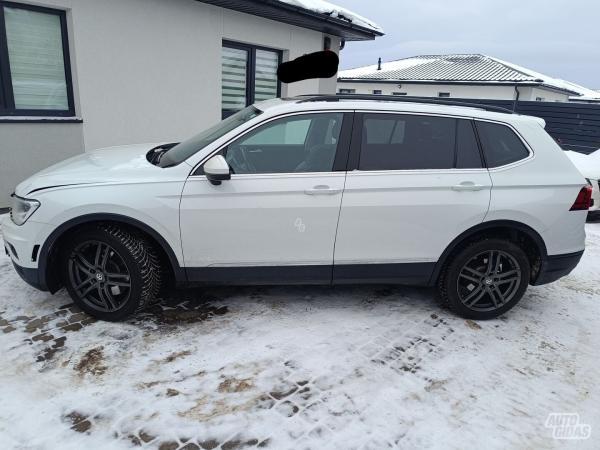 White Volkswagen Tiguan 2018 in Klaipeda, with an engine capacity of 2.00 L and mileage of 250 thousand km for 7700 €, photo 4 on AUTOMOTO.COM.LV
