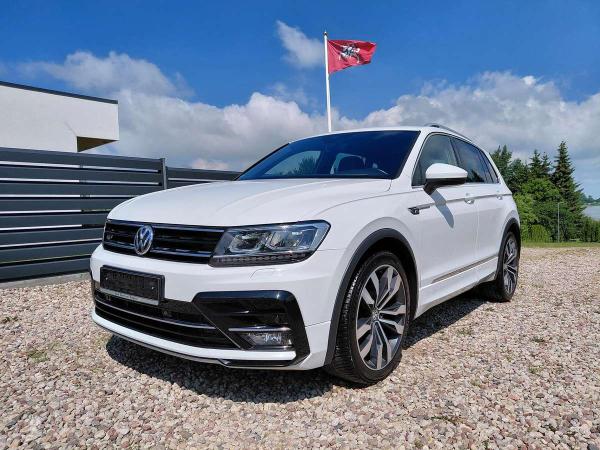 White Volkswagen Tiguan 2018 in Vilkaviskis, with an engine capacity of 1.97 L and mileage of 233 thousand km for 16200 €, photo 1 on AUTOMOTO.COM.LV
