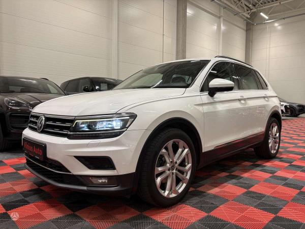 White Volkswagen Tiguan 2018 in Vilnius, with an engine capacity of 1.40 L and mileage of 219 thousand km for 15990 €, photo 1 on AUTOMOTO.COM.LV