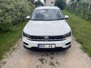 White Volkswagen Tiguan 2018 in Riga, with an engine capacity of 2.00 L and mileage of 74 thousand km for 17500 €, photo  on AUTOMOTO.COM.LV