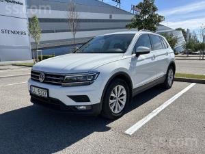White Volkswagen Tiguan 2018 in Riga, with an engine capacity of 2.00 L and mileage of 150 thousand km for 16200 €, photo 7 on AUTOMOTO.COM.LV