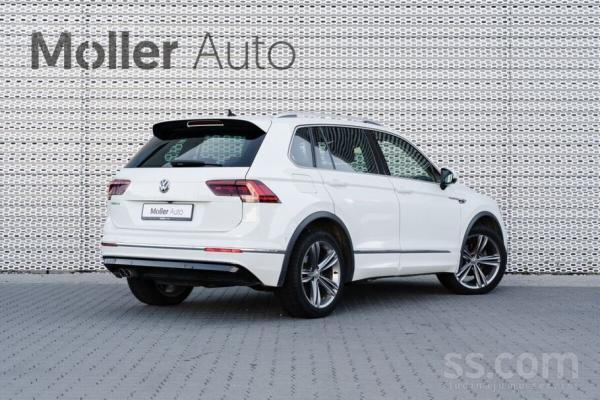 Volkswagen Tiguan 2018 Rīga vietnē Balts Volkswagen Tiguan 2018 Rīga, ar dzinēja tilpumu 2.00 L un nobraukumu 151 tūkst. km par 18800 €, foto 5 vietnē AUTOMOTO.COM.LV