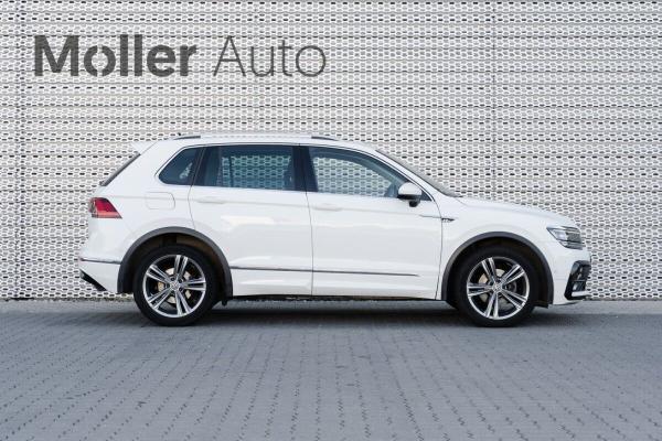 White Volkswagen Tiguan 2018 in Marupe, with an engine capacity of 2.00 L and mileage of 151 thousand km for 18800 €, photo 6 on AUTOMOTO.COM.LV