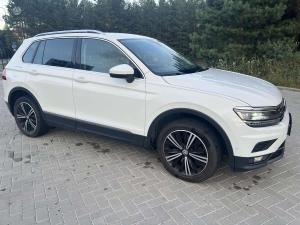White Volkswagen Tiguan 2018 in Vilnius, with an engine capacity of 1.97 L and mileage of 253 thousand km for 14600 €, photo  on AUTOMOTO.COM.LV