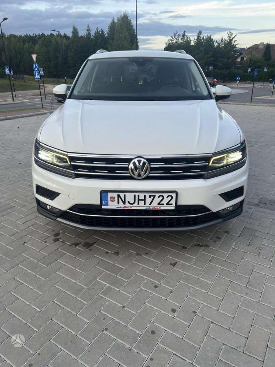 White Volkswagen Tiguan 2018 in Vilnius, with an engine capacity of 1.97 L and mileage of 253 thousand km for 14600 €, photo 6 on AUTOMOTO.COM.LV