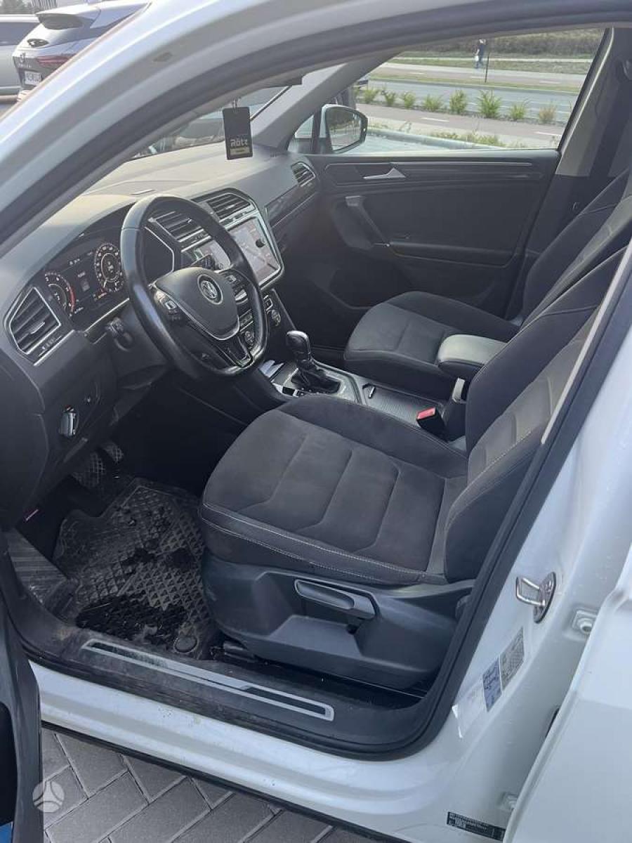 White Volkswagen Tiguan 2018 in Vilnius, with an engine capacity of 1.97 L and mileage of 253 thousand km for 14600 €, photo 8 on AUTOMOTO.COM.LV