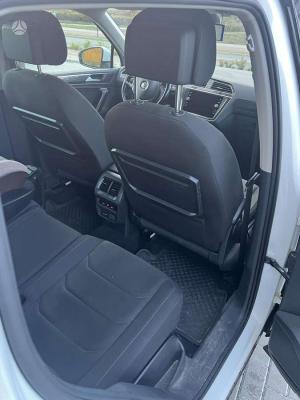 White Volkswagen Tiguan 2018 in Vilnius, with an engine capacity of 1.97 L and mileage of 253 thousand km for 14600 €, photo 14 on AUTOMOTO.COM.LV