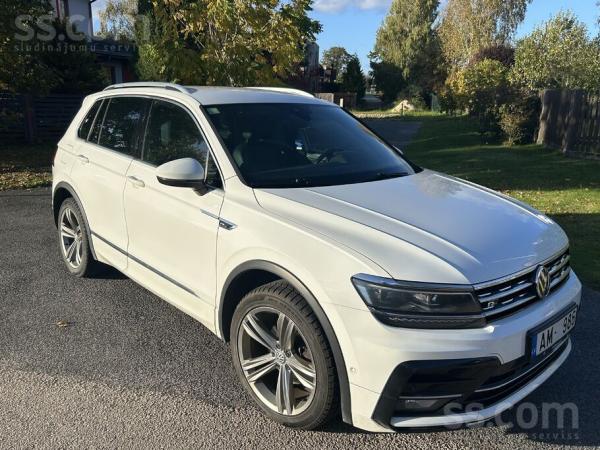 Volkswagen Tiguan 2018 Rīga vietnē Balts Volkswagen Tiguan 2018 Rīga, ar dzinēja tilpumu 2.00 L un nobraukumu 197 tūkst. km par 15500 €, foto 3 vietnē AUTOMOTO.COM.LV