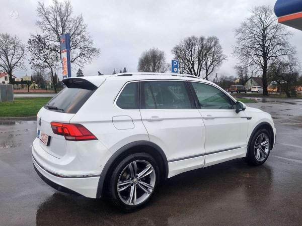 White Volkswagen Tiguan 2019 in Taurage, with an engine capacity of 2.00 L and mileage of 280 thousand km for 14900 €, photo 3 on AUTOMOTO.COM.LV