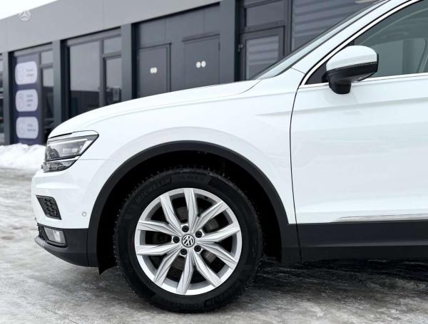 White Volkswagen Tiguan 2019 in Taurage, with an engine capacity of 2.00 L and mileage of 252 thousand km for 14400 €, photo 11 on AUTOMOTO.COM.LV
