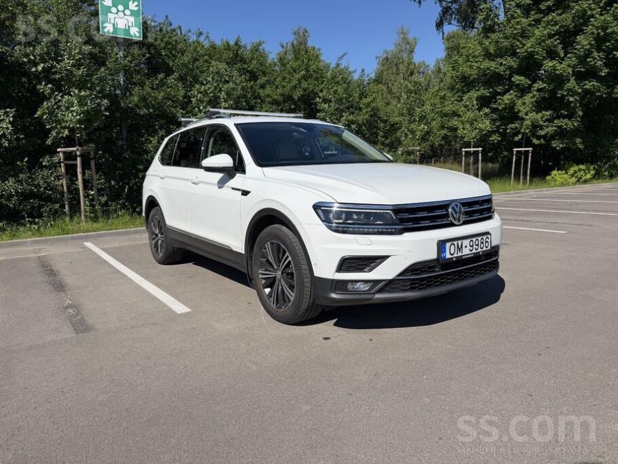 White Volkswagen Tiguan 2019 in Riga, with an engine capacity of 2.00 L and mileage of 171 thousand km for 19500 €, photo 1 on AUTOMOTO.COM.LV