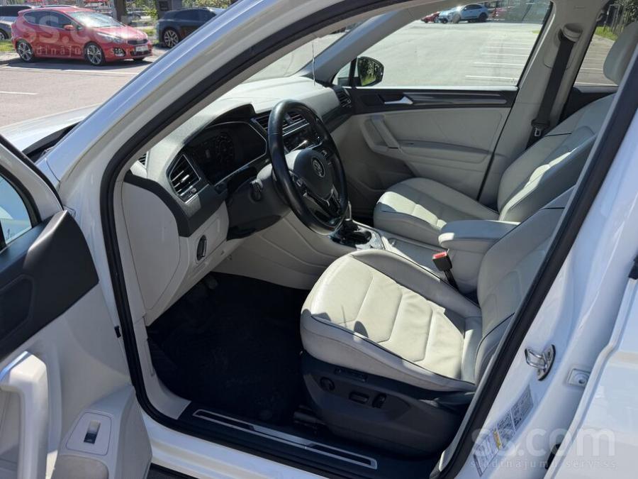 White Volkswagen Tiguan 2019 in Riga, with an engine capacity of 2.00 L and mileage of 171 thousand km for 19500 €, photo 6 on AUTOMOTO.COM.LV