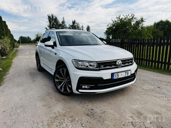White Volkswagen Tiguan 2019 in Riga, with an engine capacity of 2.00 L and mileage of 140 thousand km for 25500 €, photo 4 on AUTOMOTO.COM.LV