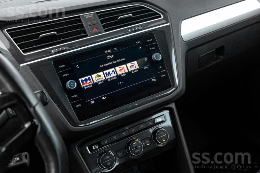 White Volkswagen Tiguan 2019 in Riga, with an engine capacity of 2.00 L and mileage of 195 thousand km for 13000 €, photo 14 on AUTOMOTO.COM.LV